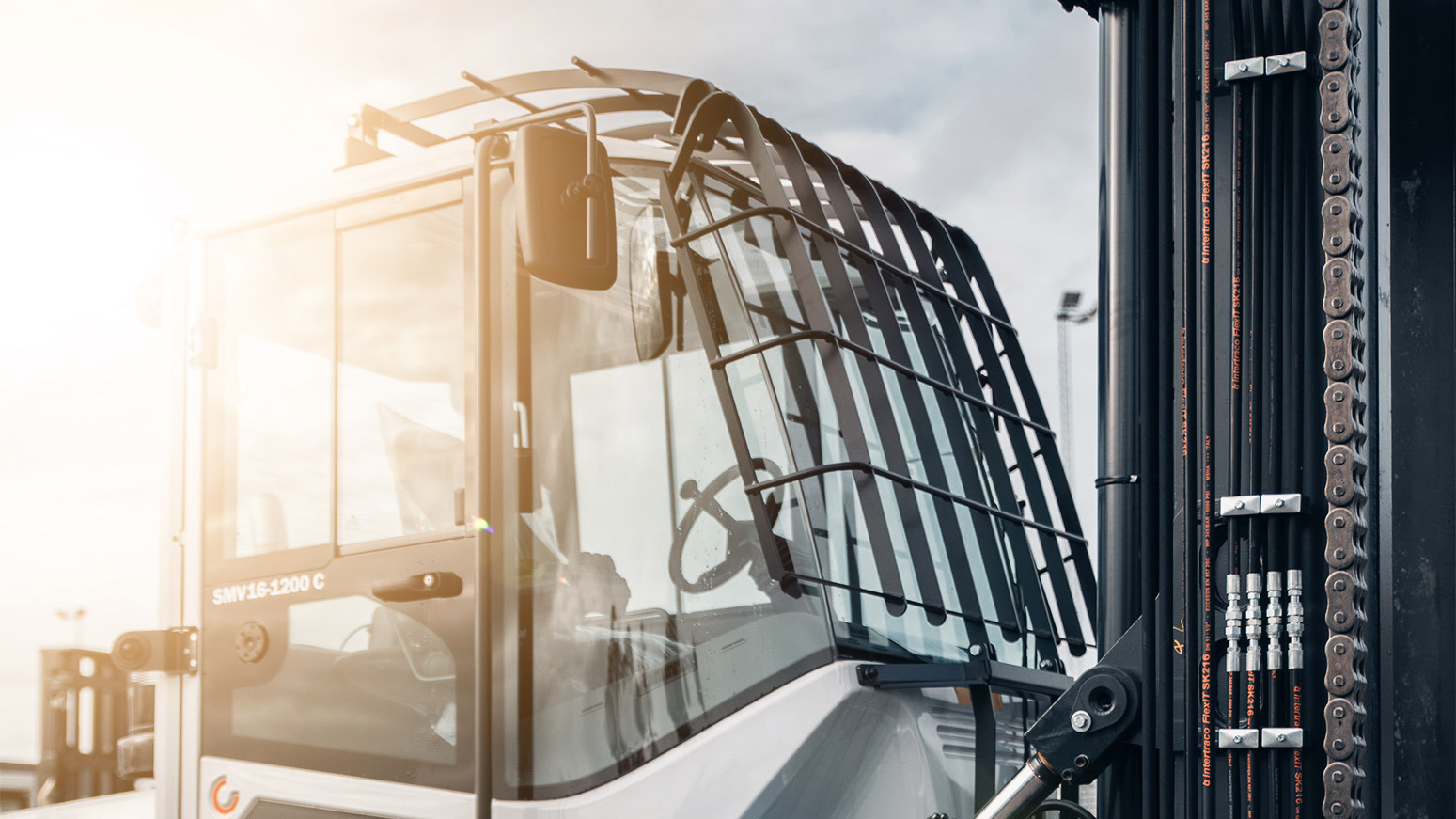 Overhead safety attachments for lift trucks in demanding environments